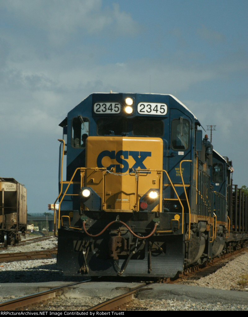 Slug 2345 on the headend of train laying rail